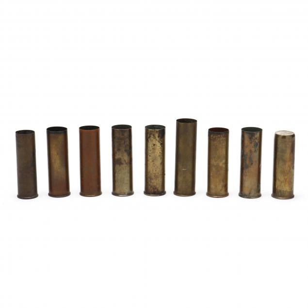 Price guide for NINE EARLY BRASS SHOTGUN SHELLS A