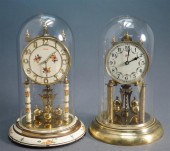 Price guide for TWO TORSION PENDULUM CLOCKS BY